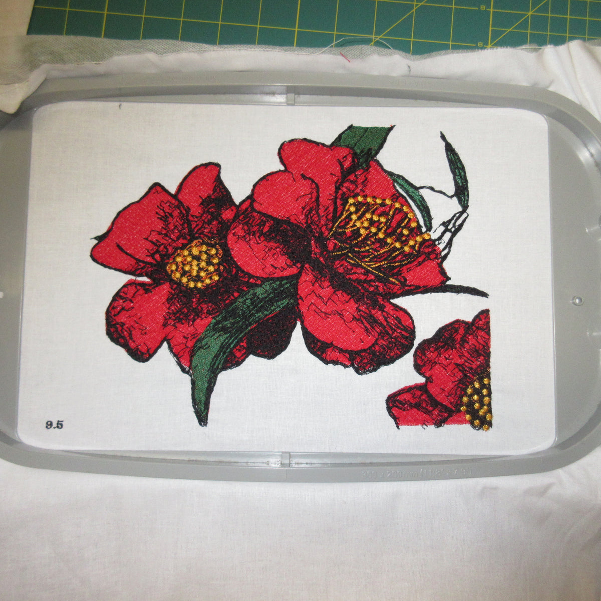Camellia Embroidery Design By CS Murphy – Handes of a Woman